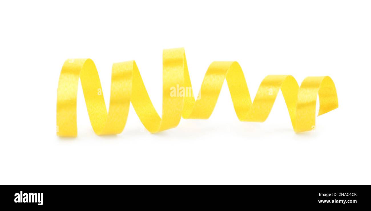 Shiny yellow serpentine streamer isolated on white Stock Photo - Alamy