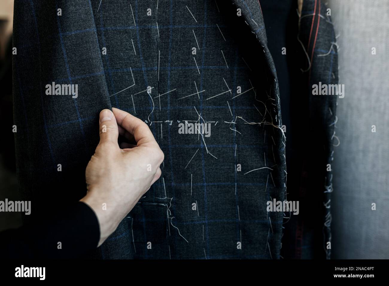 atelier for tailoring. professional tailor working Stock Photo - Alamy