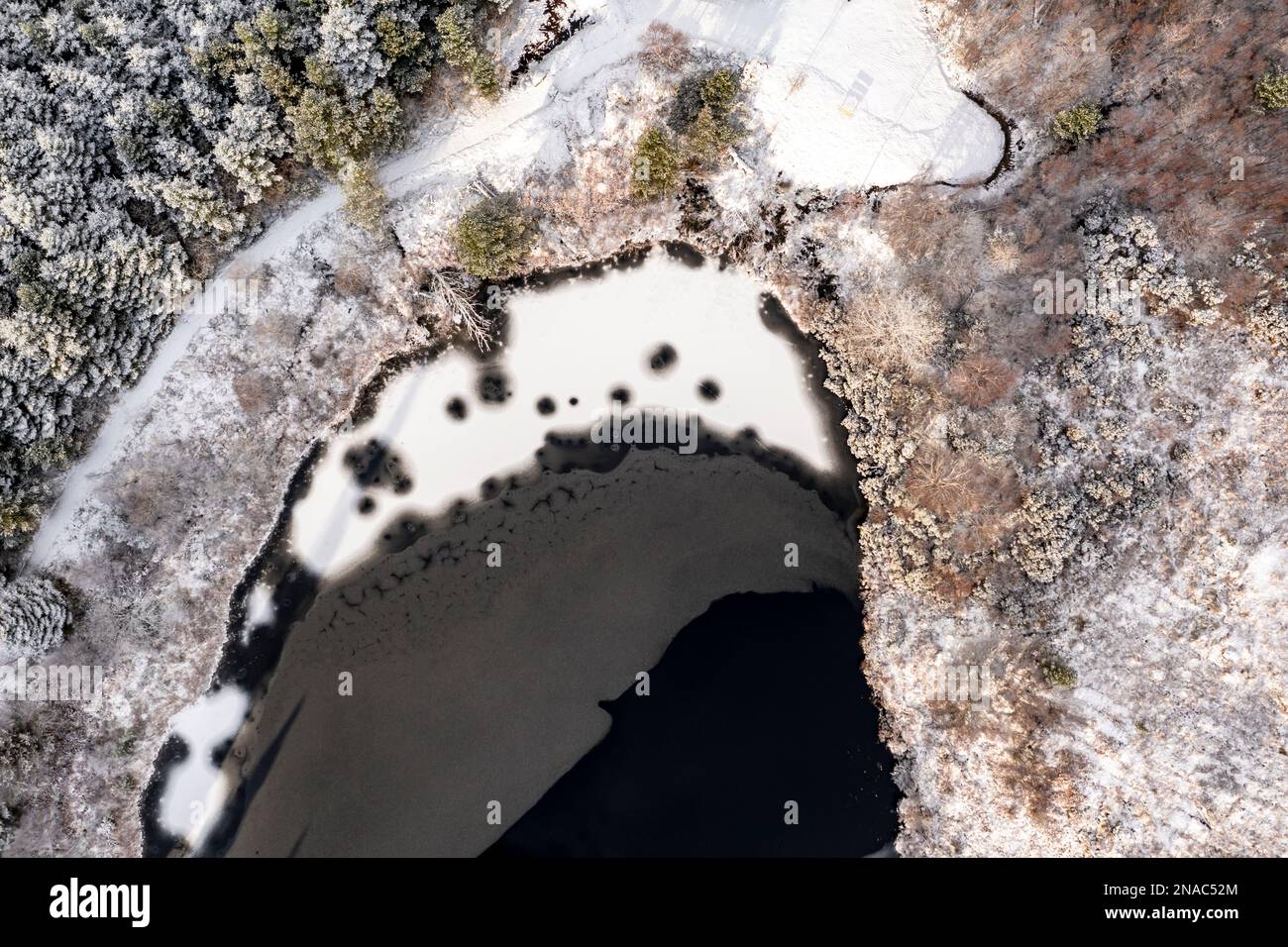 Aerial view of Lough Namanlagh and snow covered Bonny Glen by Portnoo ...