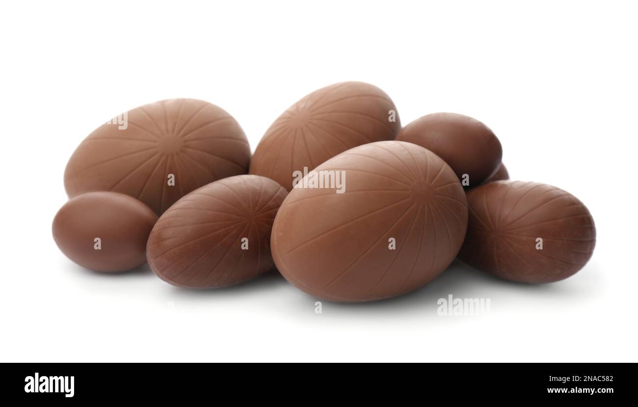 Many sweet chocolate eggs on white background Stock Photo - Alamy