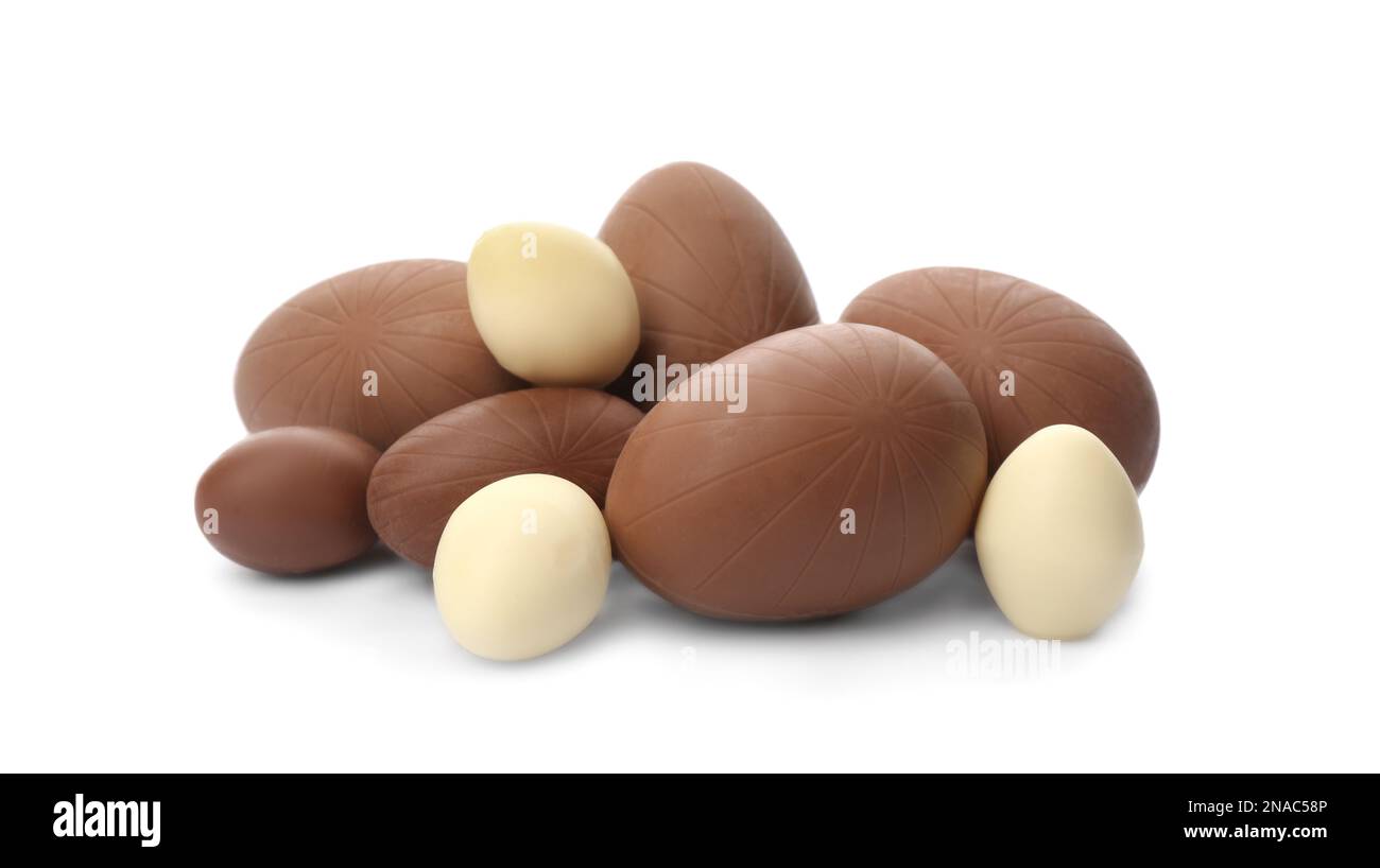 Many sweet chocolate eggs on white background Stock Photo - Alamy