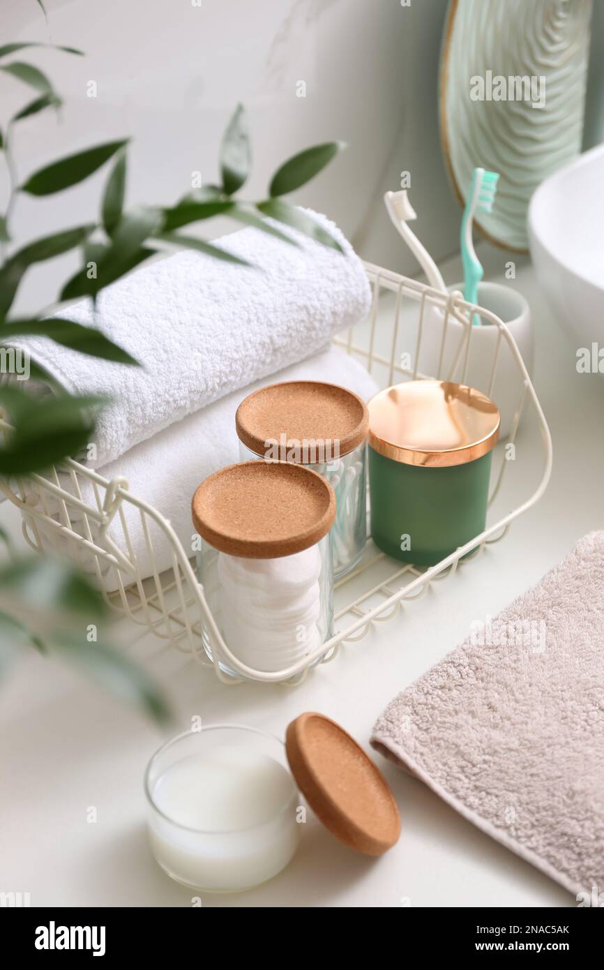 Personal hygiene products and toiletries on table in bathroom Stock ...