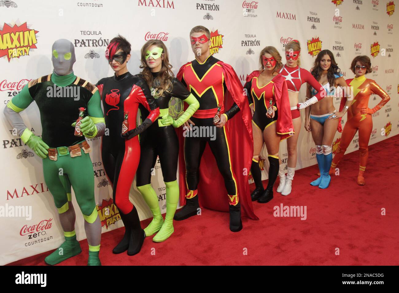 Models dressed as super heros arrive at the Patrón Tequila Presents ...