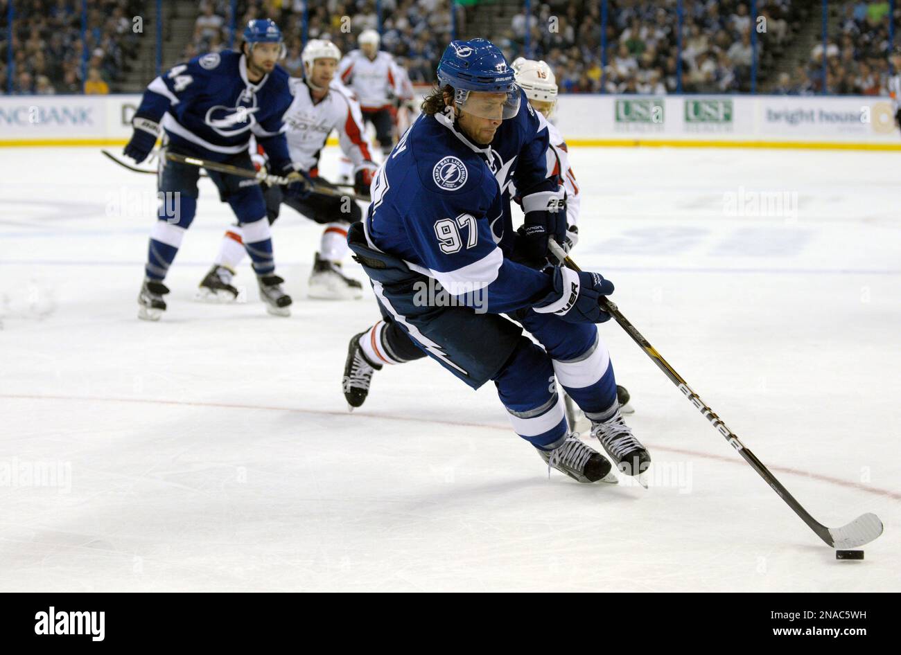 Tampa Bay Lightning defenseman Matt Gilroy (97) works the puck in front ...