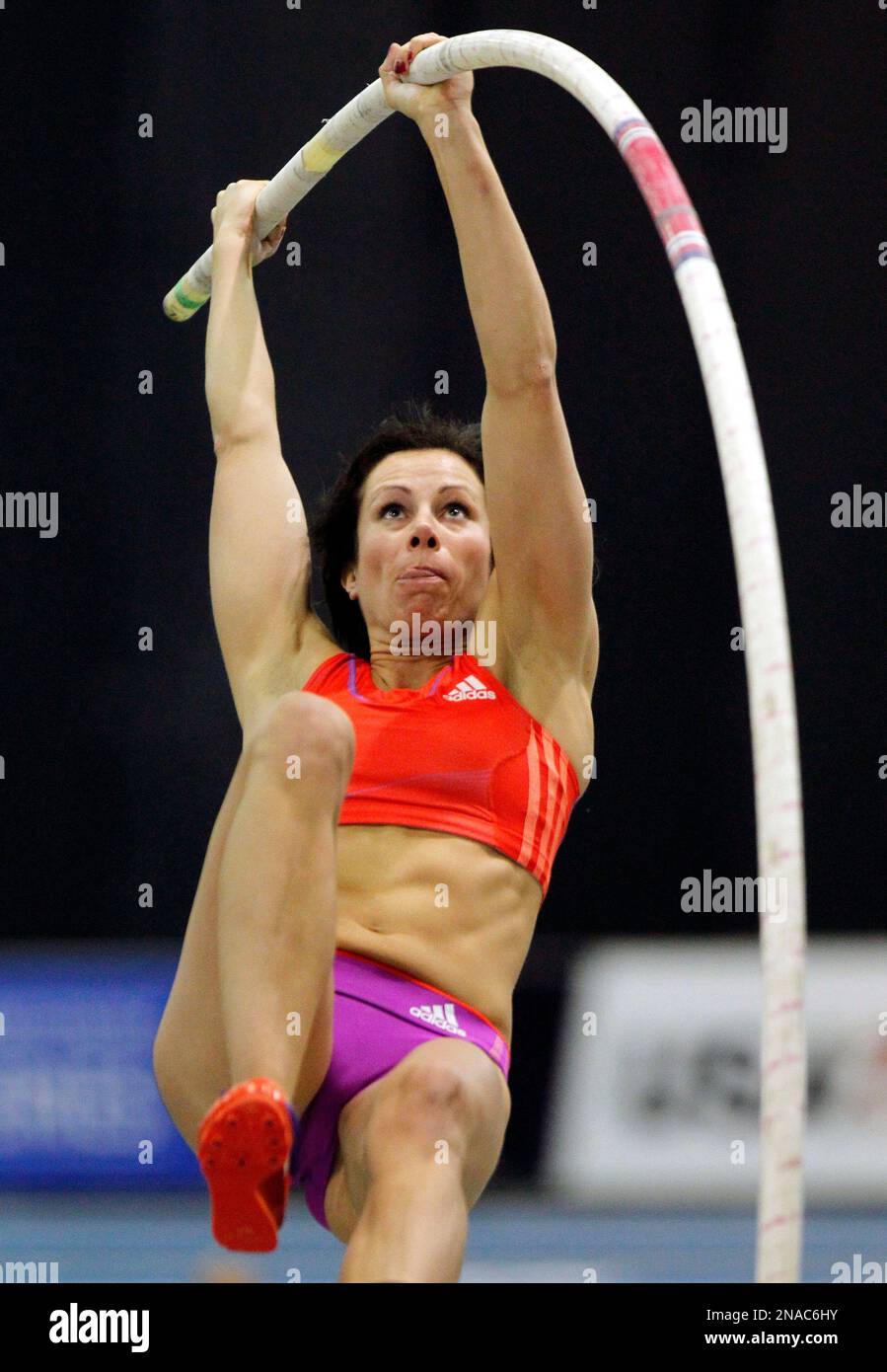 Jenn Suhr competes in the women's pole vault at the Boston Indoor Games ...