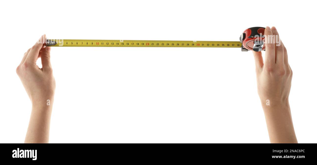 Woman holding tape measure on white background, closeup. Construction ...
