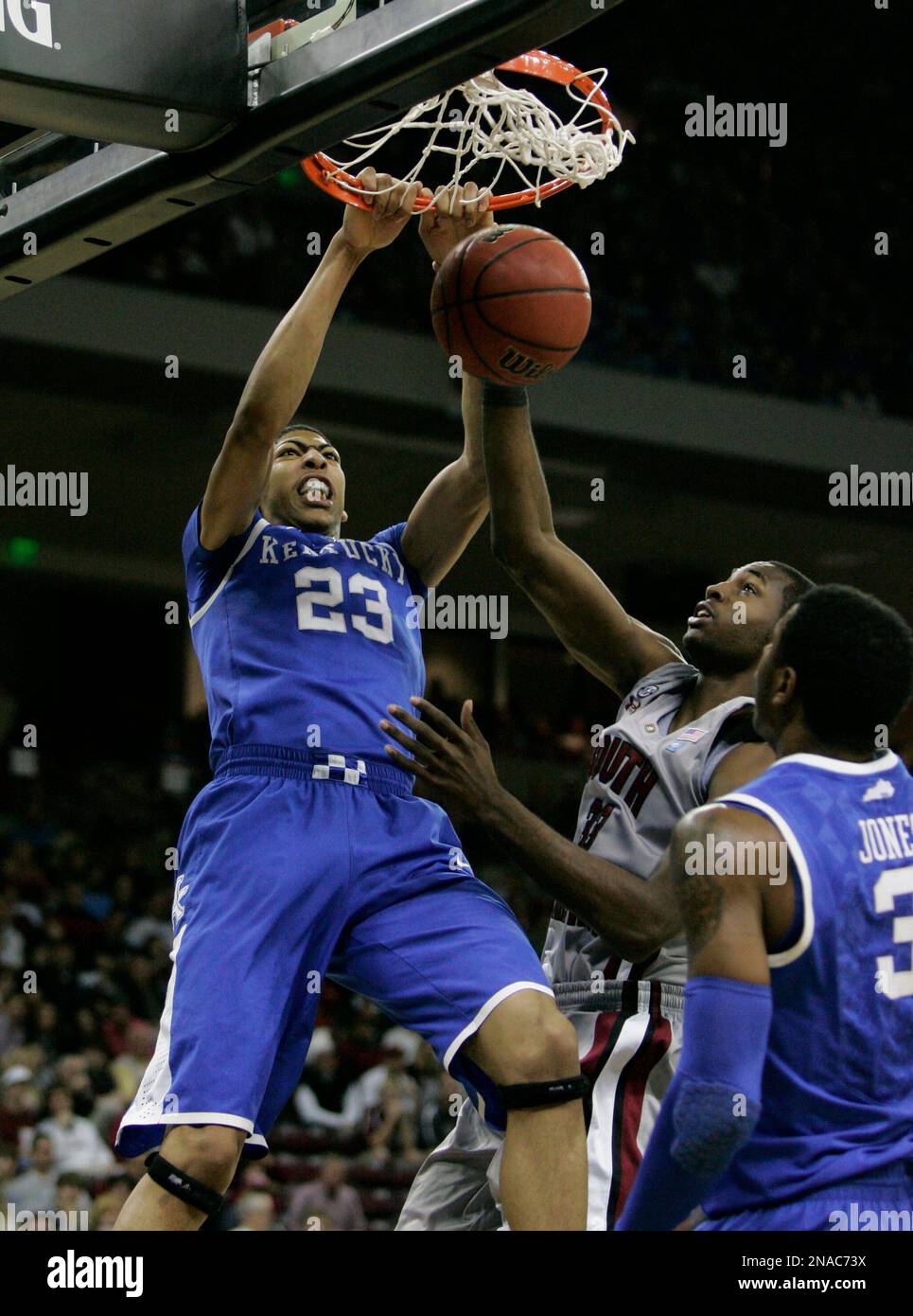 Kentucky forward Anthony Davis (23) dunks over South Carolina's R.J ...