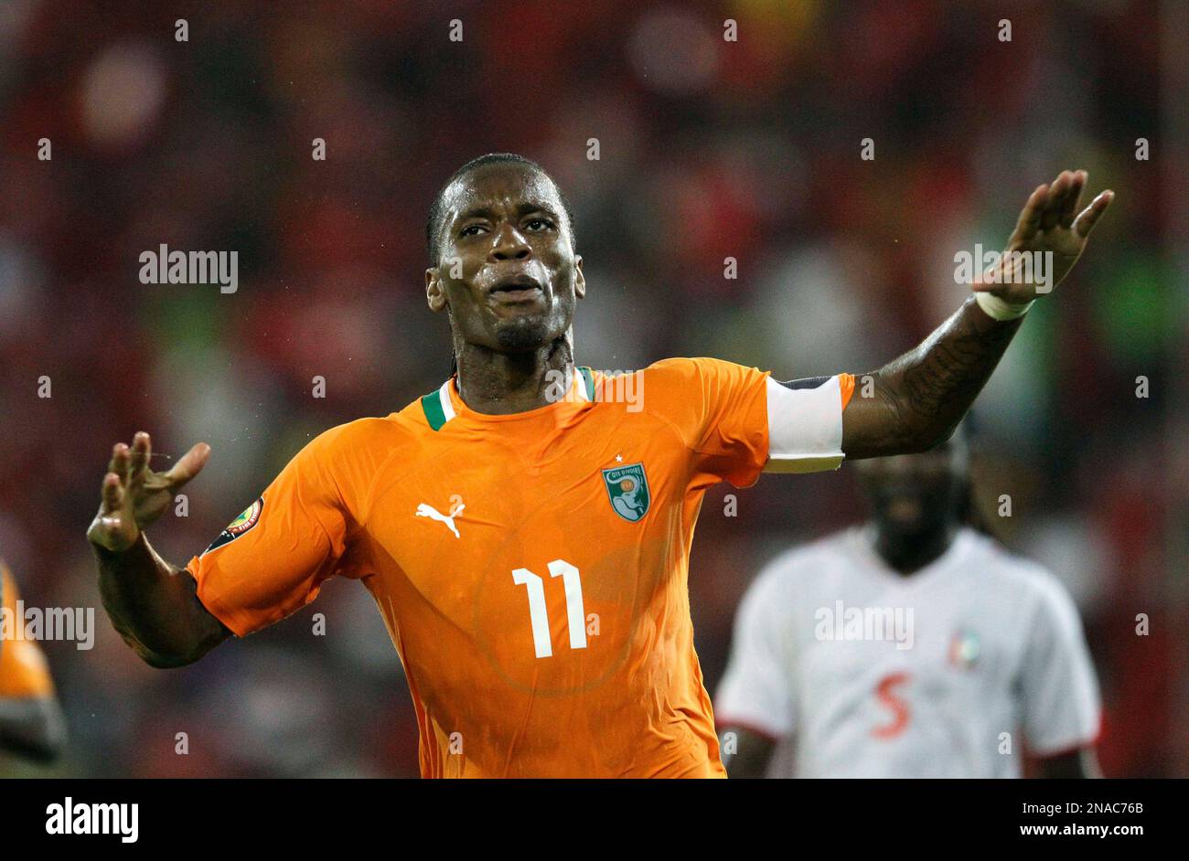 Ivory Coast's captain Didier Drogba celebrates after scoring the first ...