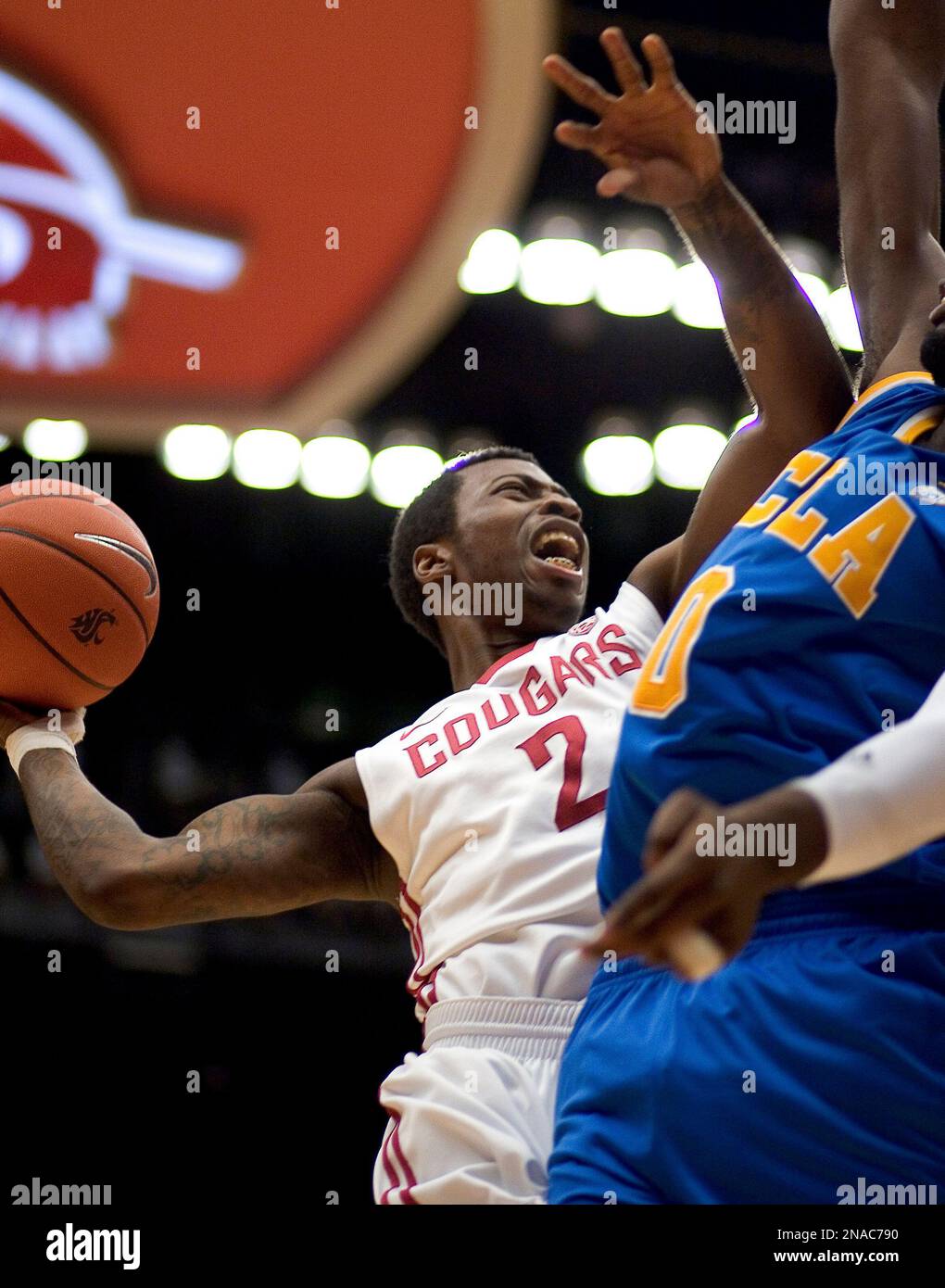 Washington State guard Mike Ladd (2) attempts a shot against UCLA ...