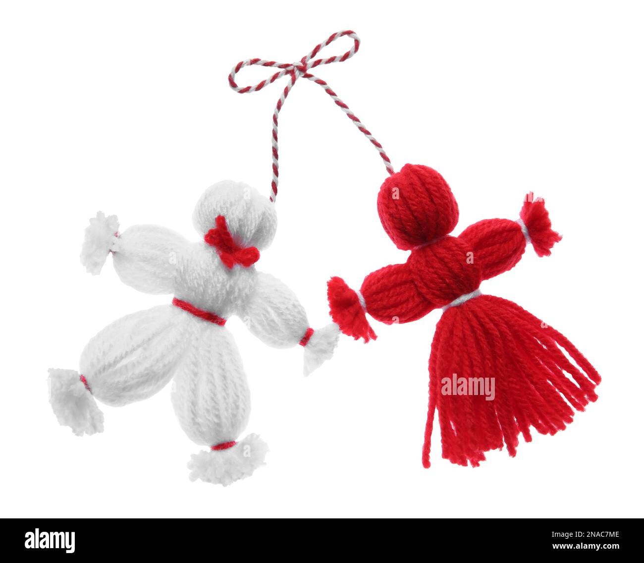 Traditional martisor shaped as man and woman on white background ...