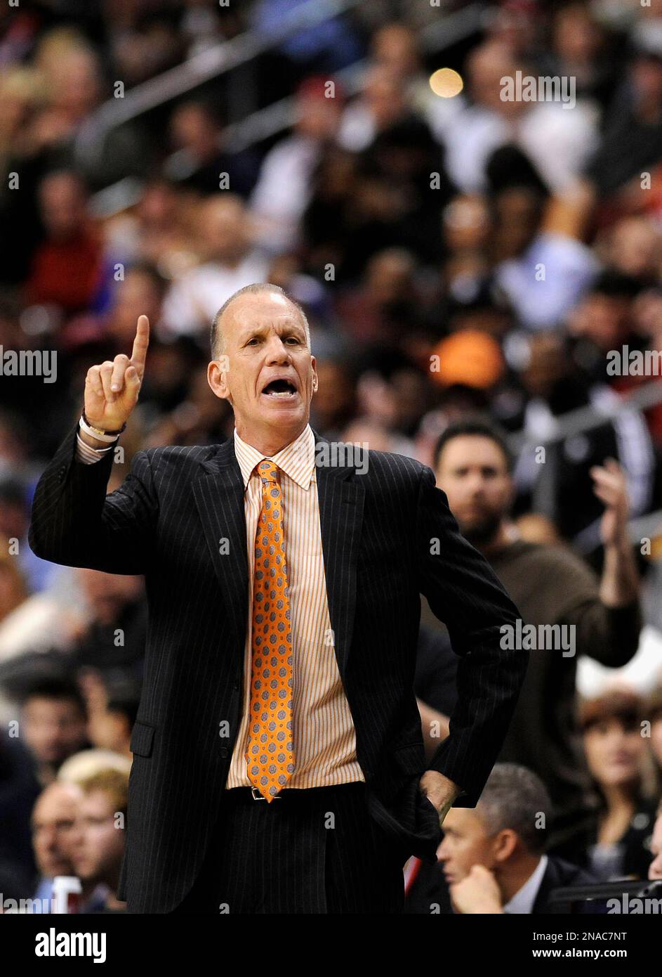 Philadelphia 76ers coach Doug Collins calls out a play in the first ...