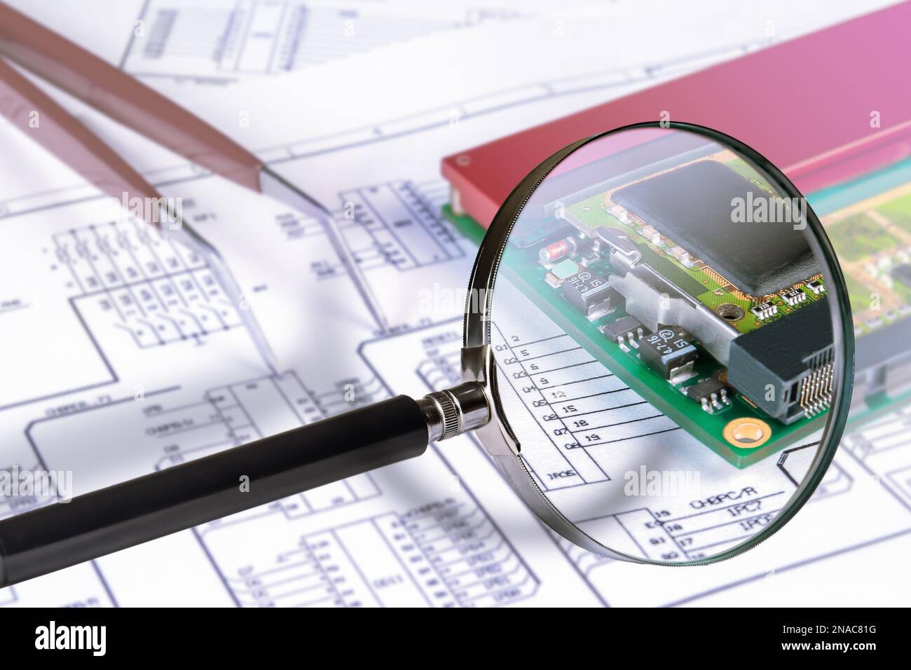 Electronic board, magnifying glass and tweezers on background of ...