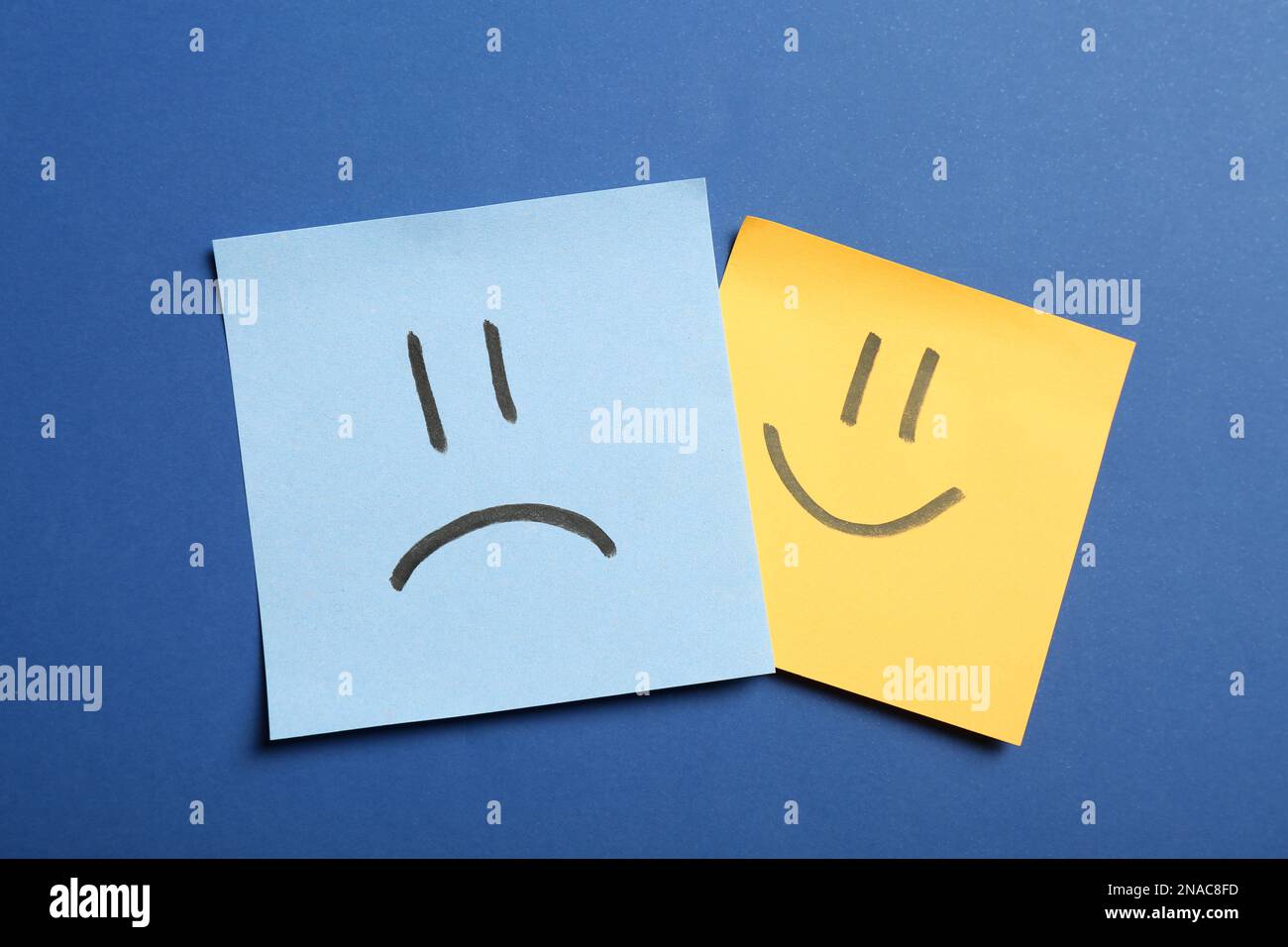 Stickers with sad and happy faces on blue background, flat lay Stock ...