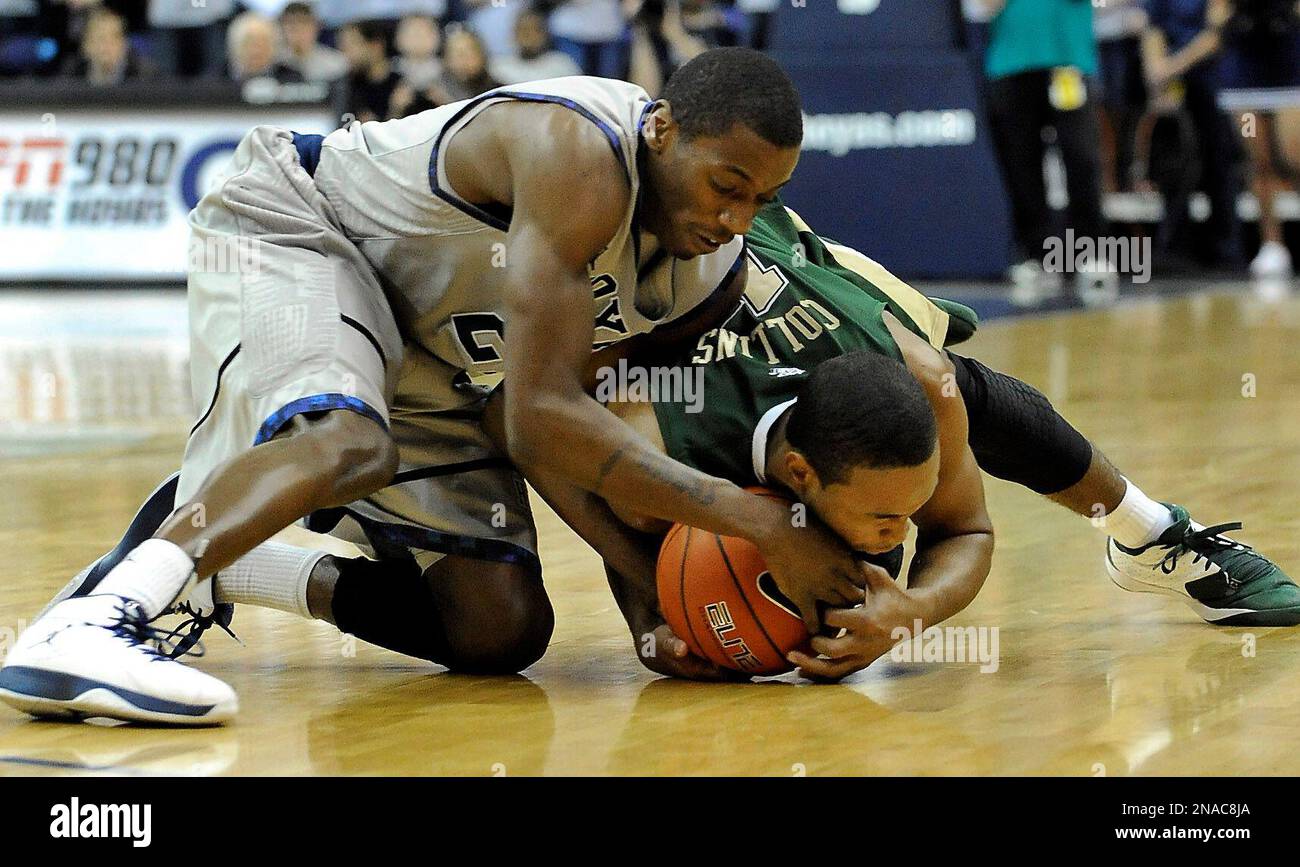Georgetown's Jason Clark, left, and South Florida's Anthony Collins ...