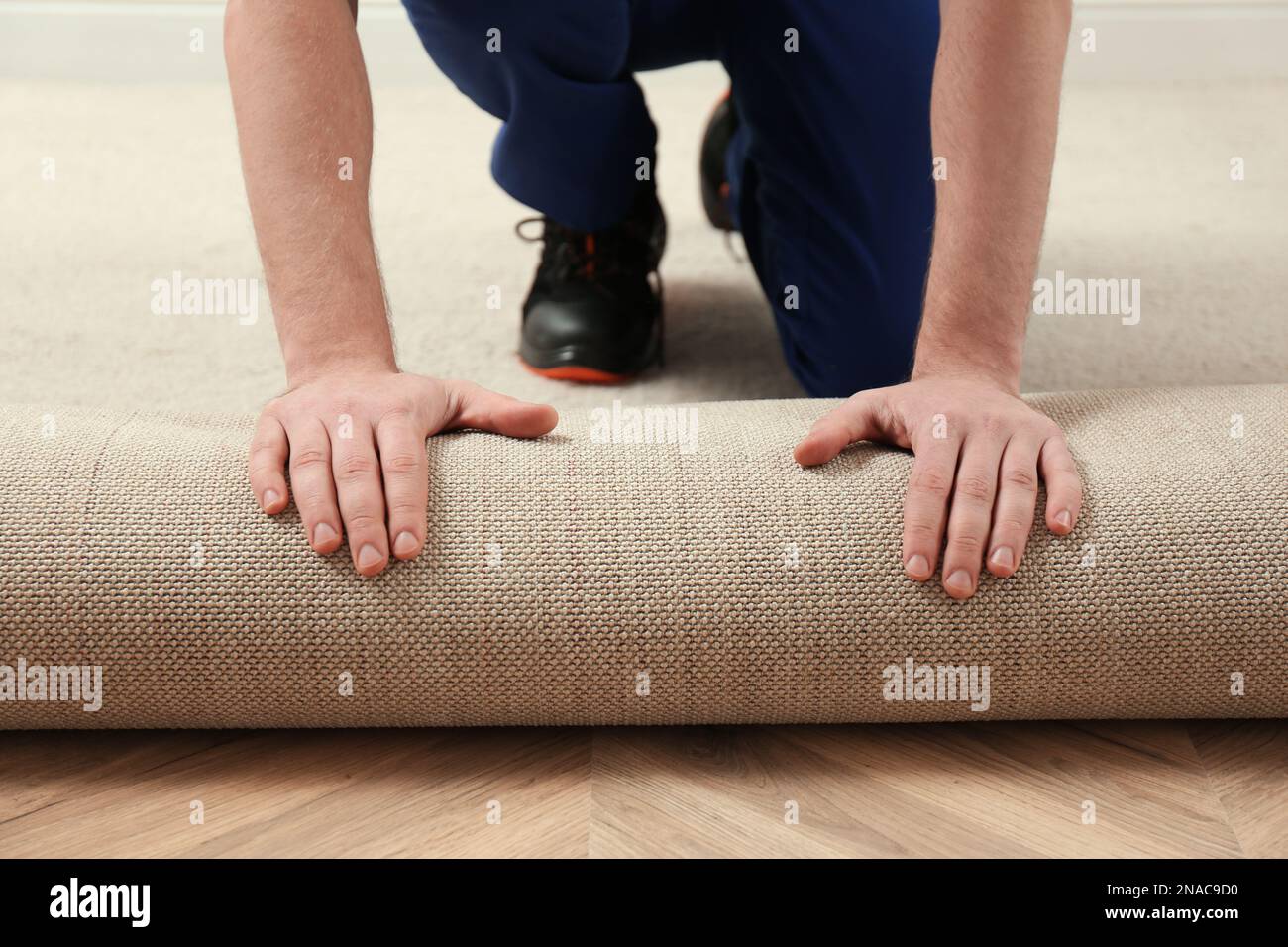 Rolling on floor employee hi-res stock photography and images - Alamy