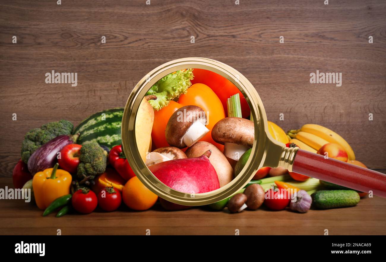 Magnifying glass focusing on mushrooms. Food control Stock Photo - Alamy