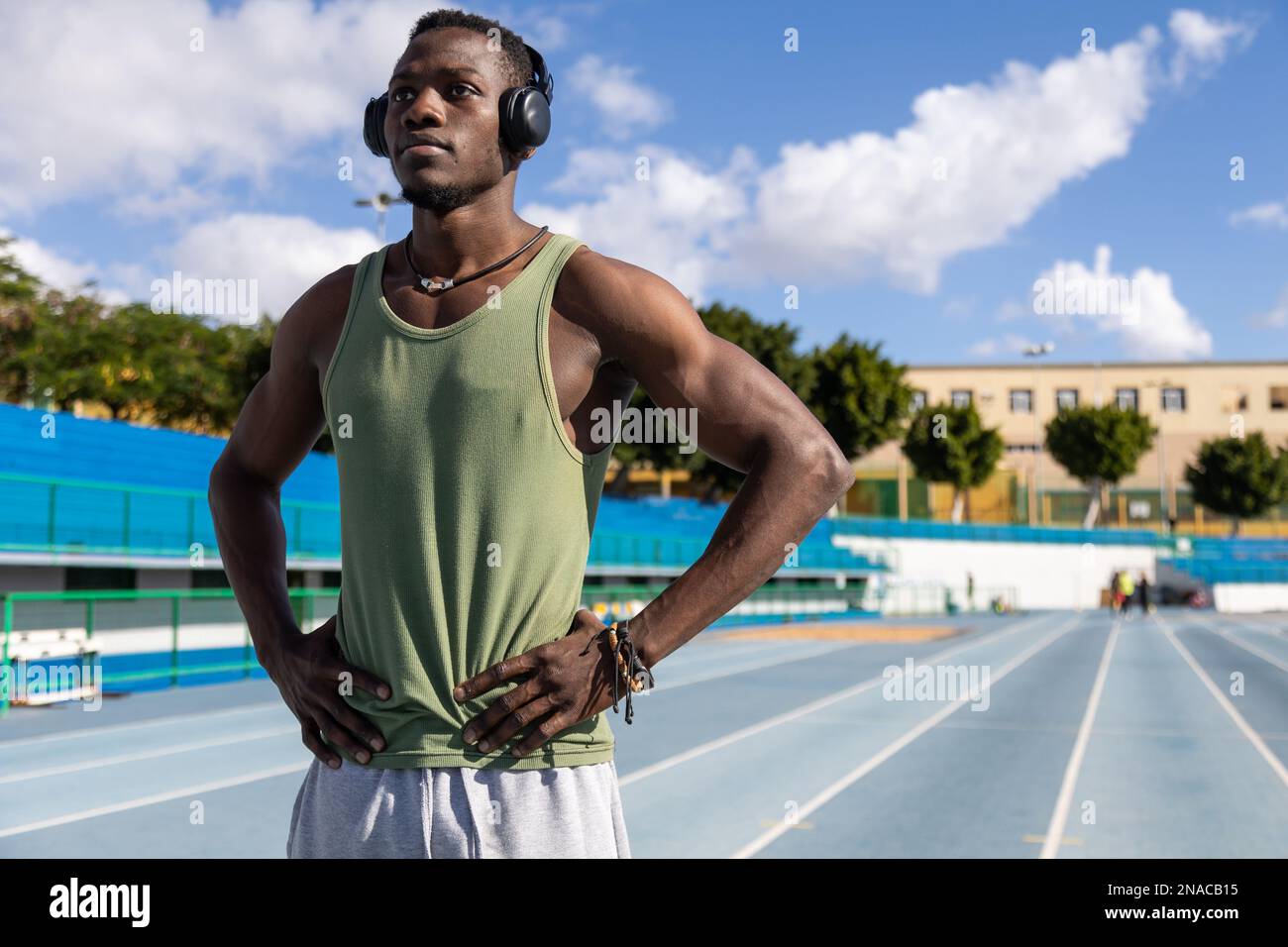 portrait of young african male athlete on athletic track Stock Photo ...