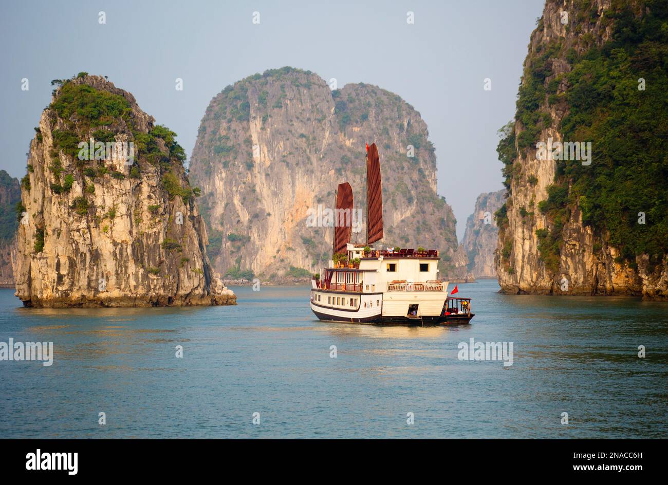 IndoChina Junk with sail raised, Bai Tu Long Bay in the Halong Bay ...