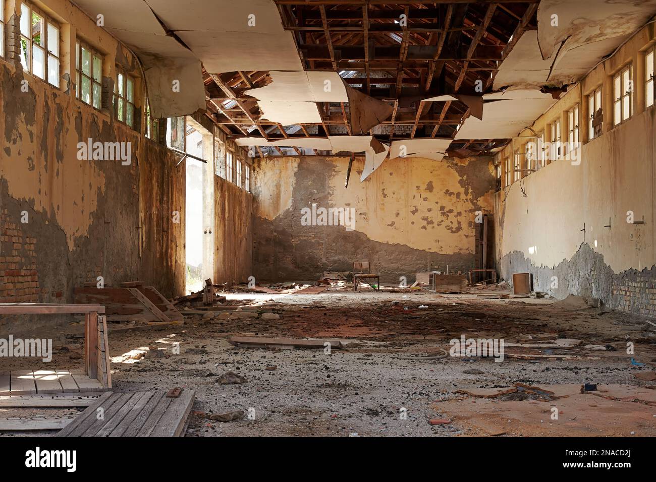 Old destroyed and damaged room in the obsolete building. War and damage ...