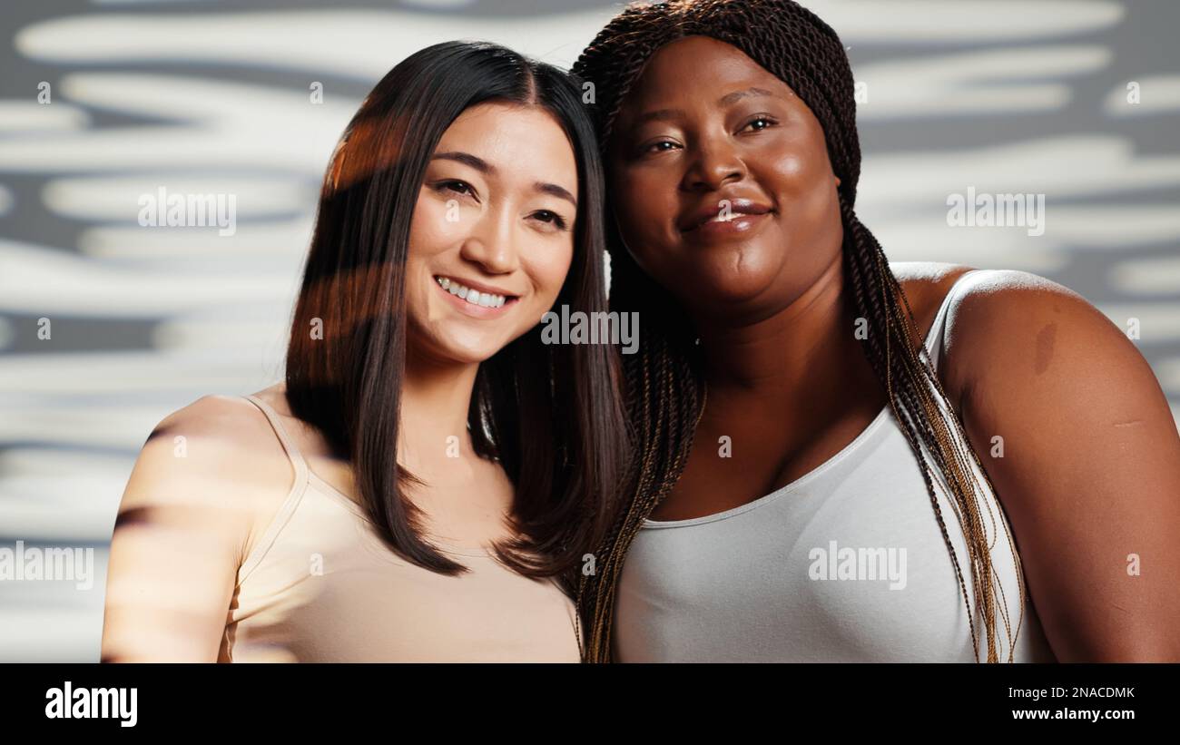 Models doing skincare wellness campaign in studio, diverse women posing ...