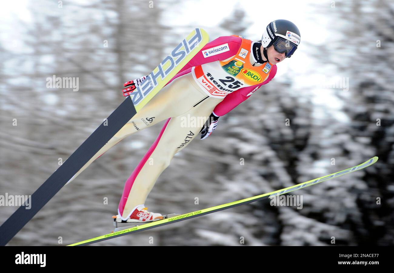 Switzerland Tim Hug is airborne during the ski jumping phase of a men's ...