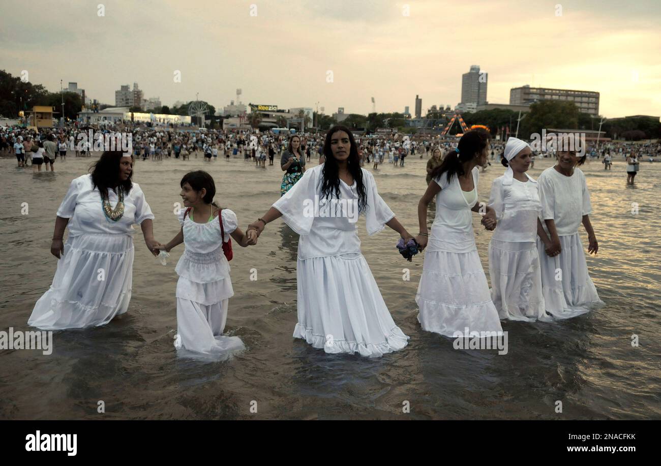 People participate in a ritual honoring Iemanja, the African Goddess of ...
