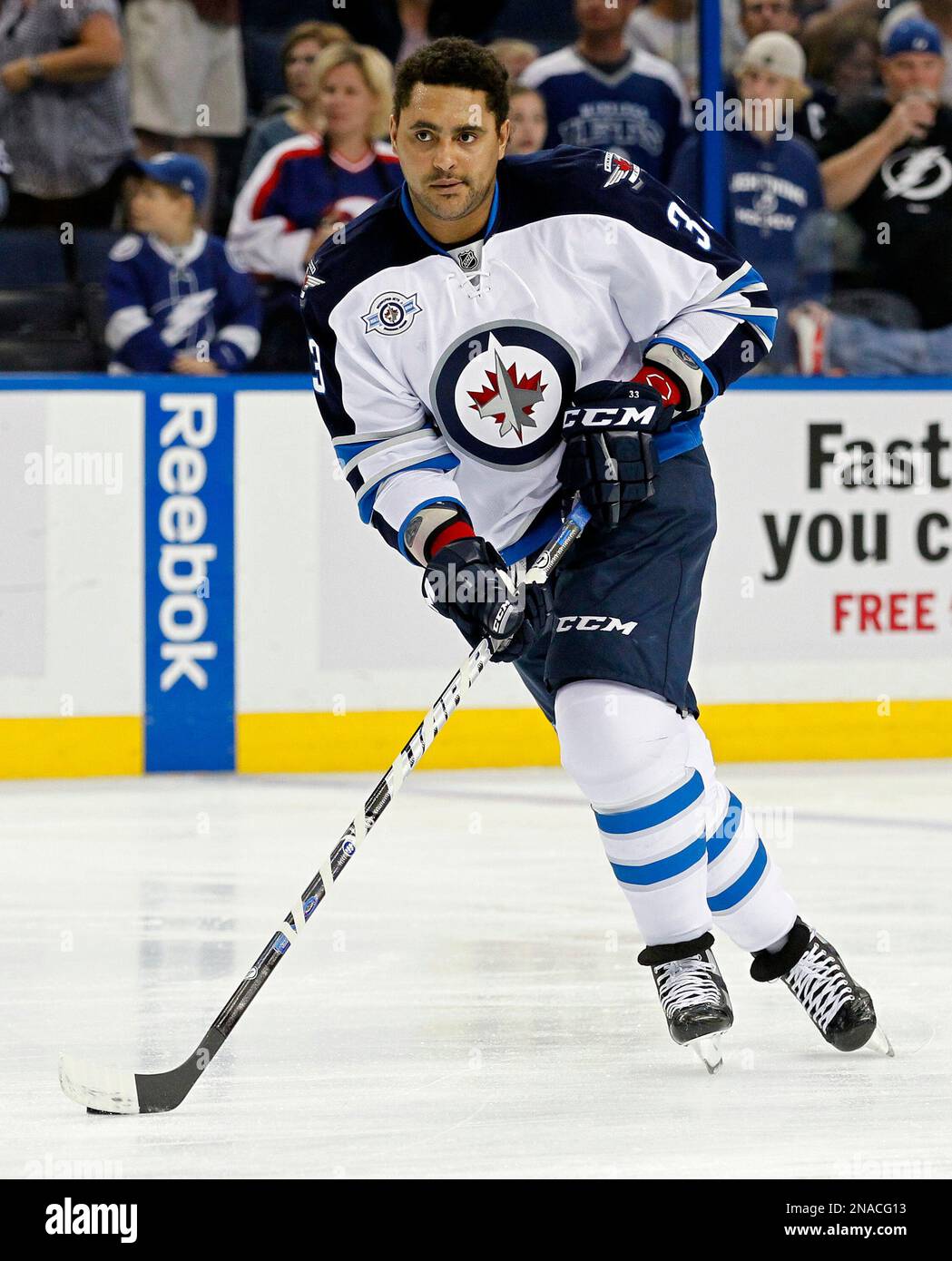 Winnipeg Jets' Dustin Byfuglien warms up prior to an NHL hockey game ...