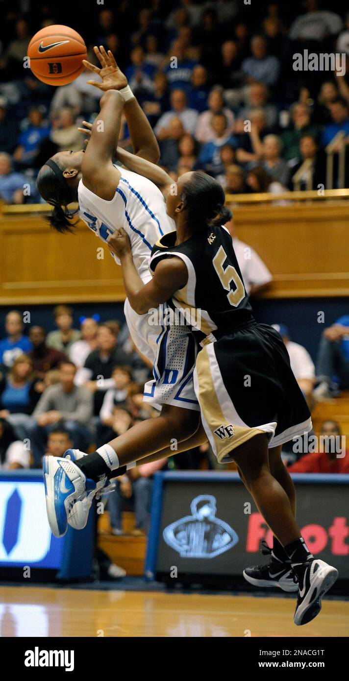 Duke's Chelsea Gray, left, is hit in the face by Wake Forest's Chelsea ...