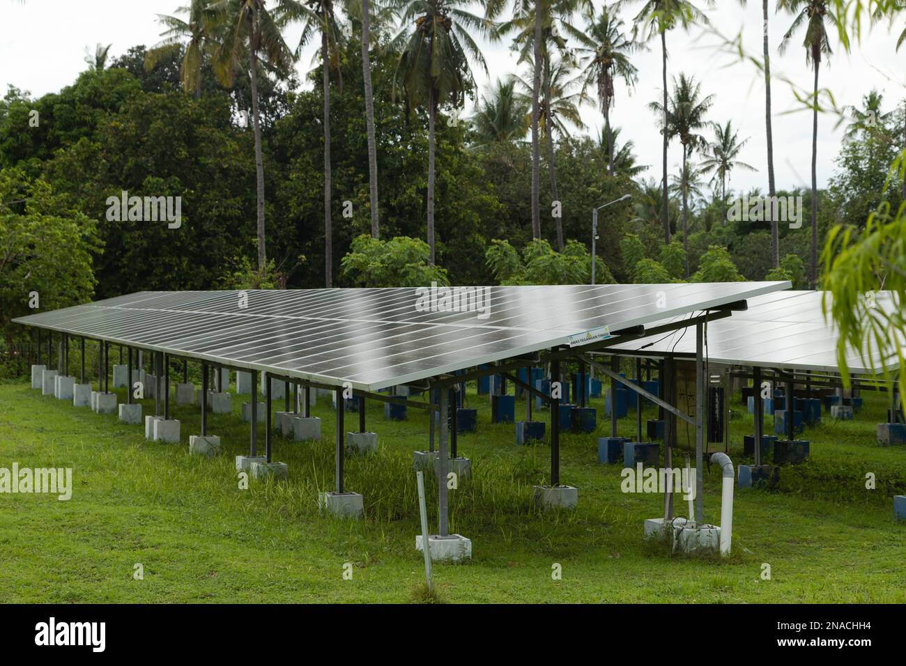 Solar power plant energy panels on tropical island Gili Air, Indonesia ...