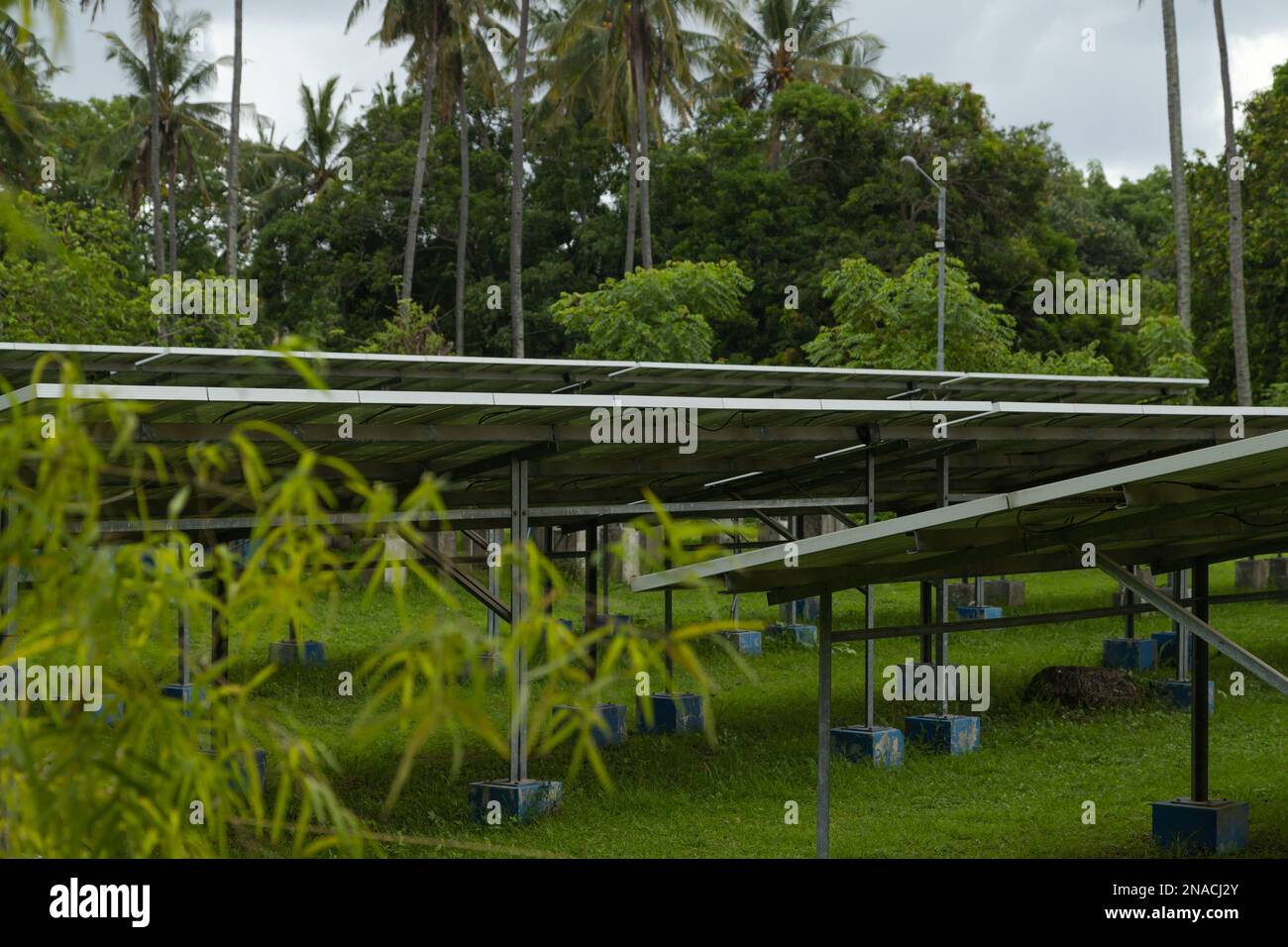 Solar power plant energy panels on tropical island Gili Air, Indonesia ...