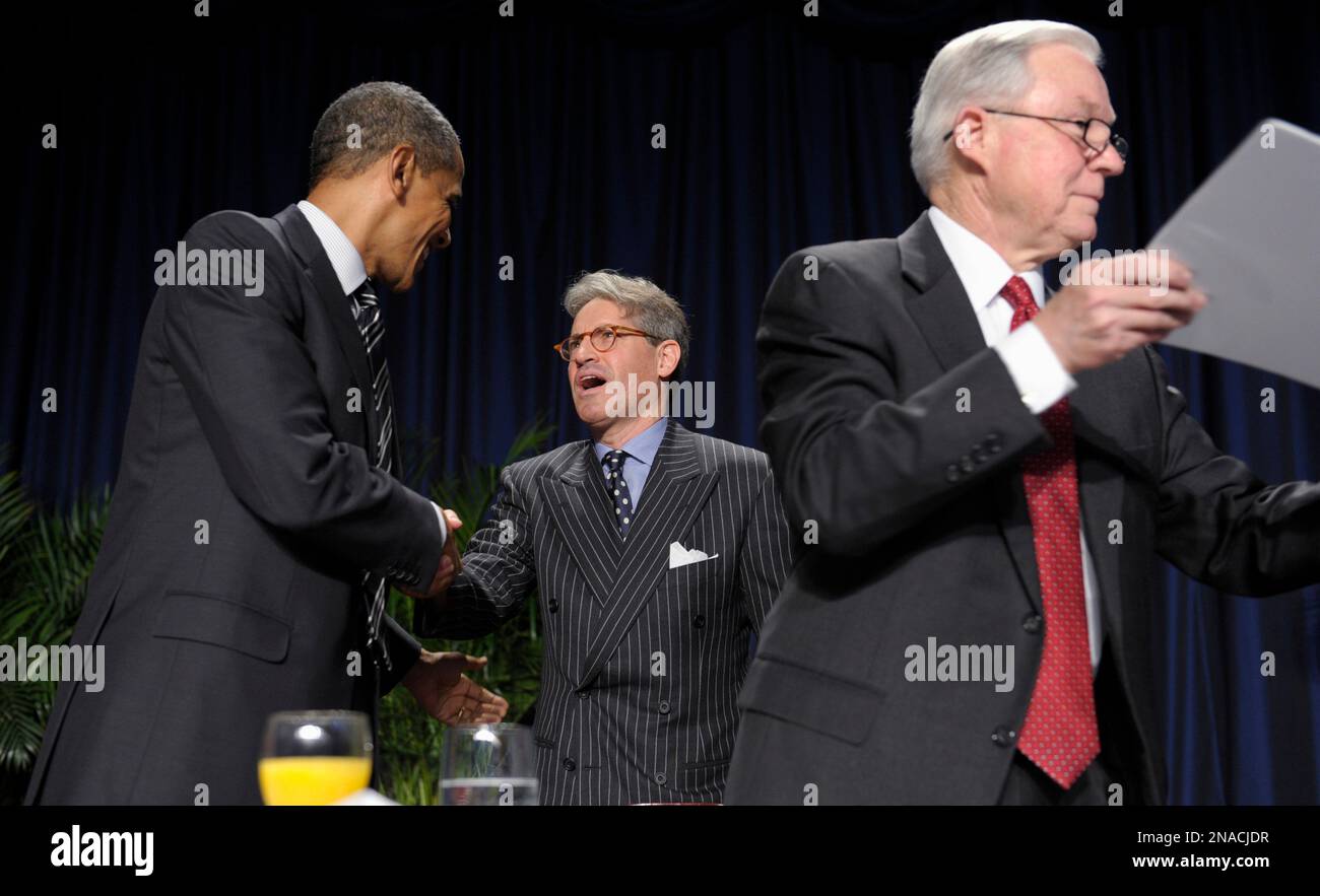 President Barack Obama, left, talks to author and keynote speaker Eric ...