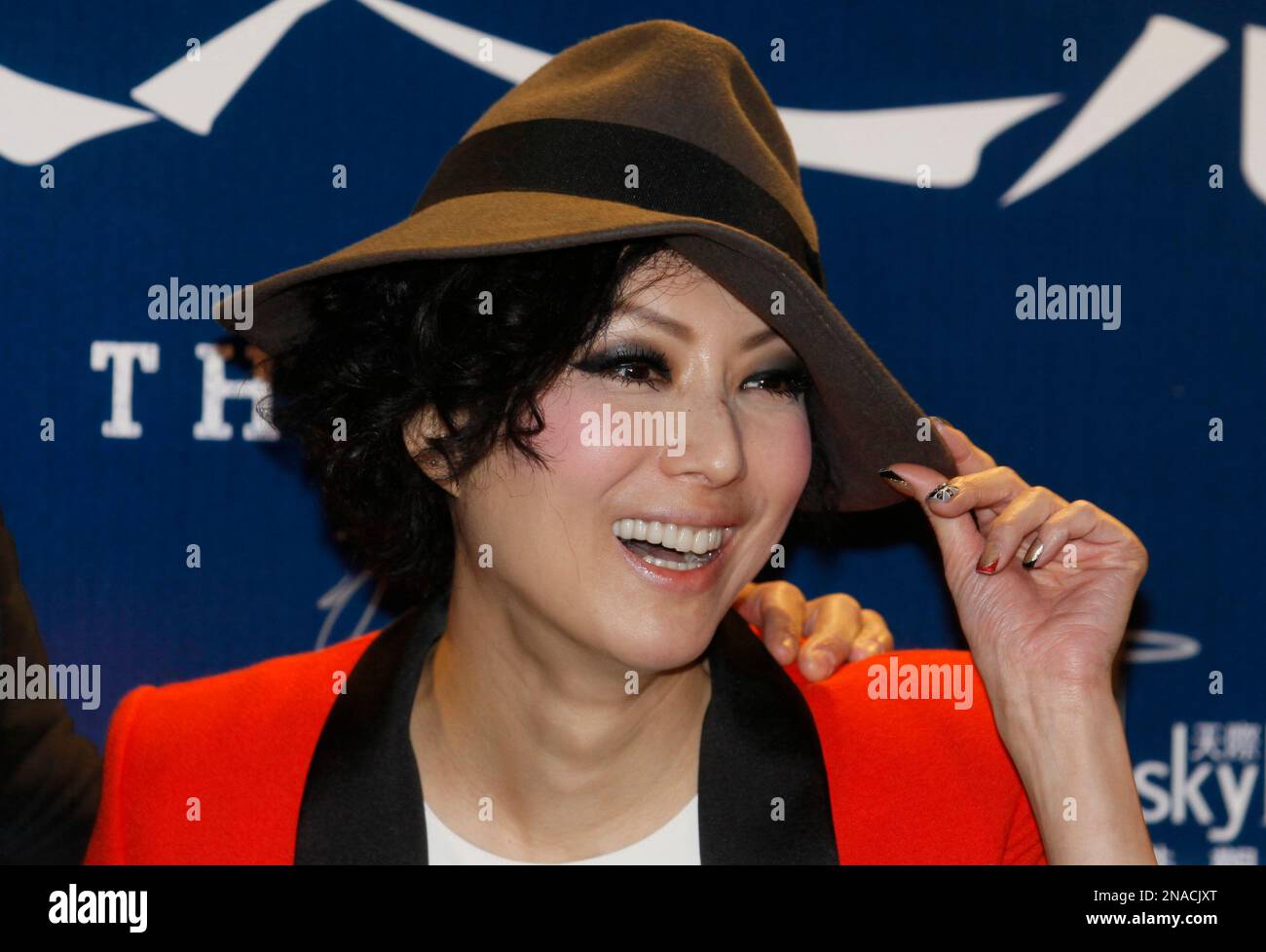 Hong Kong actress Sammi Cheng poses at the premiere of her movie ...