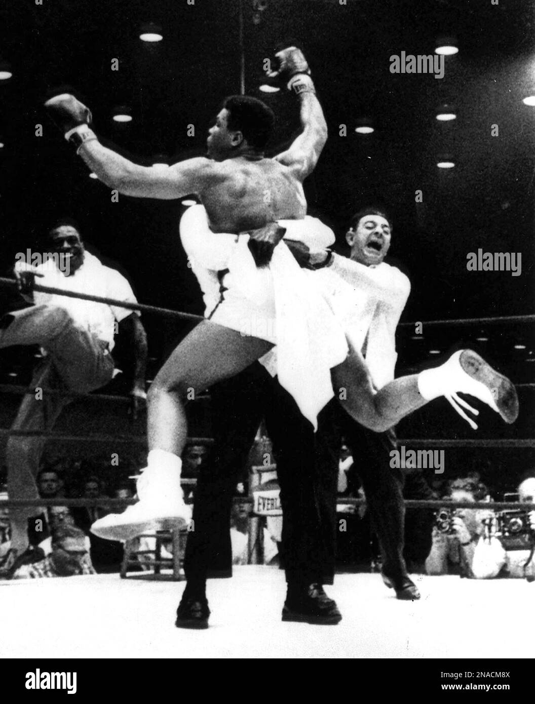 FILE - In this Feb. 25, 1964, file photo, with flailing arms and legs ...