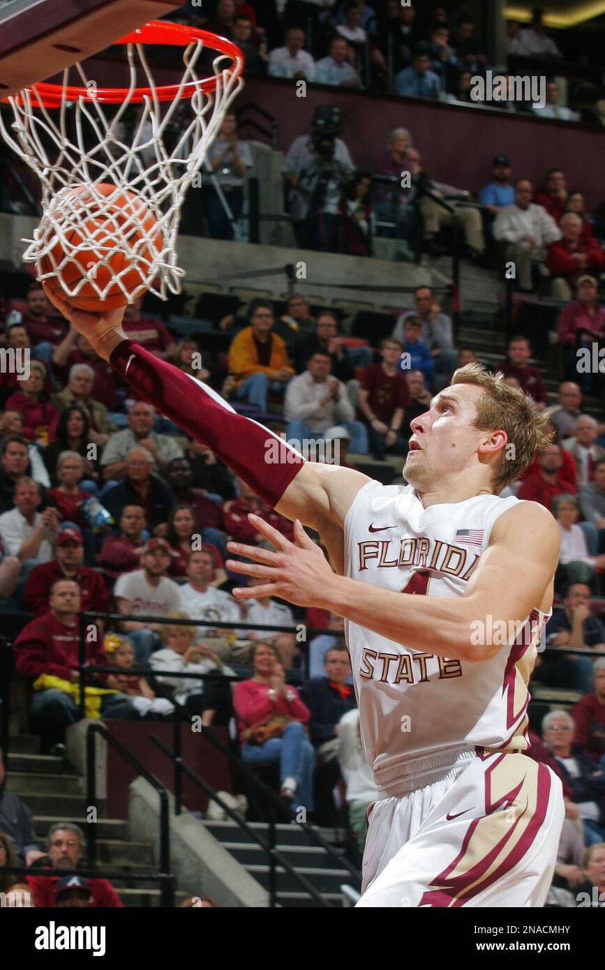 Florida State's Deividas Dulkys (4) makes a layup on a breakaway steal ...