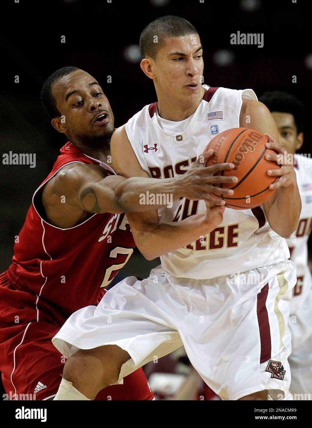 North Carolina State's Lorenzo Brown, left, vies for control of the ...