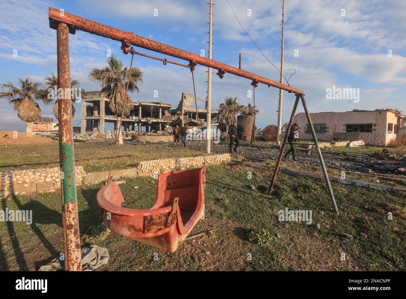 Gaza, Palestine. 13th Feb, 2023. Palestinians inspect a destroyed ...