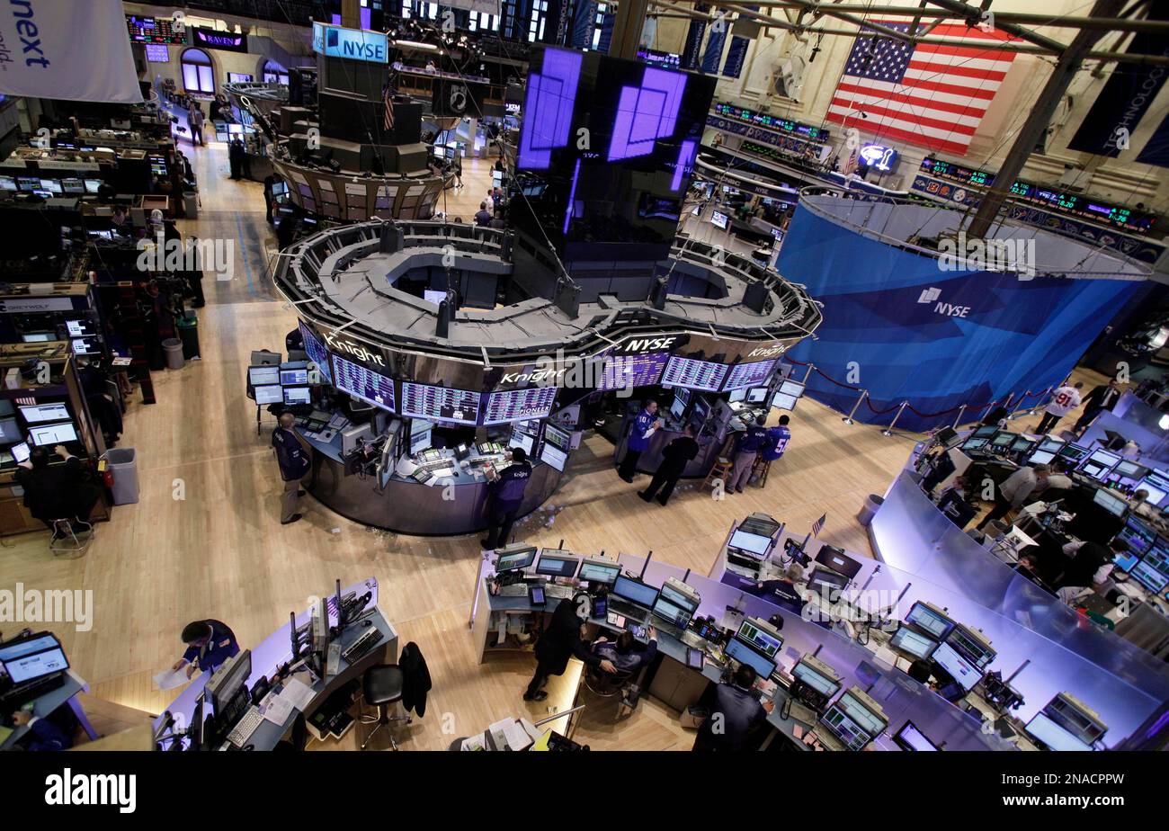 People work on the floor of the New York Stock Exchange, Wednesday, Feb ...