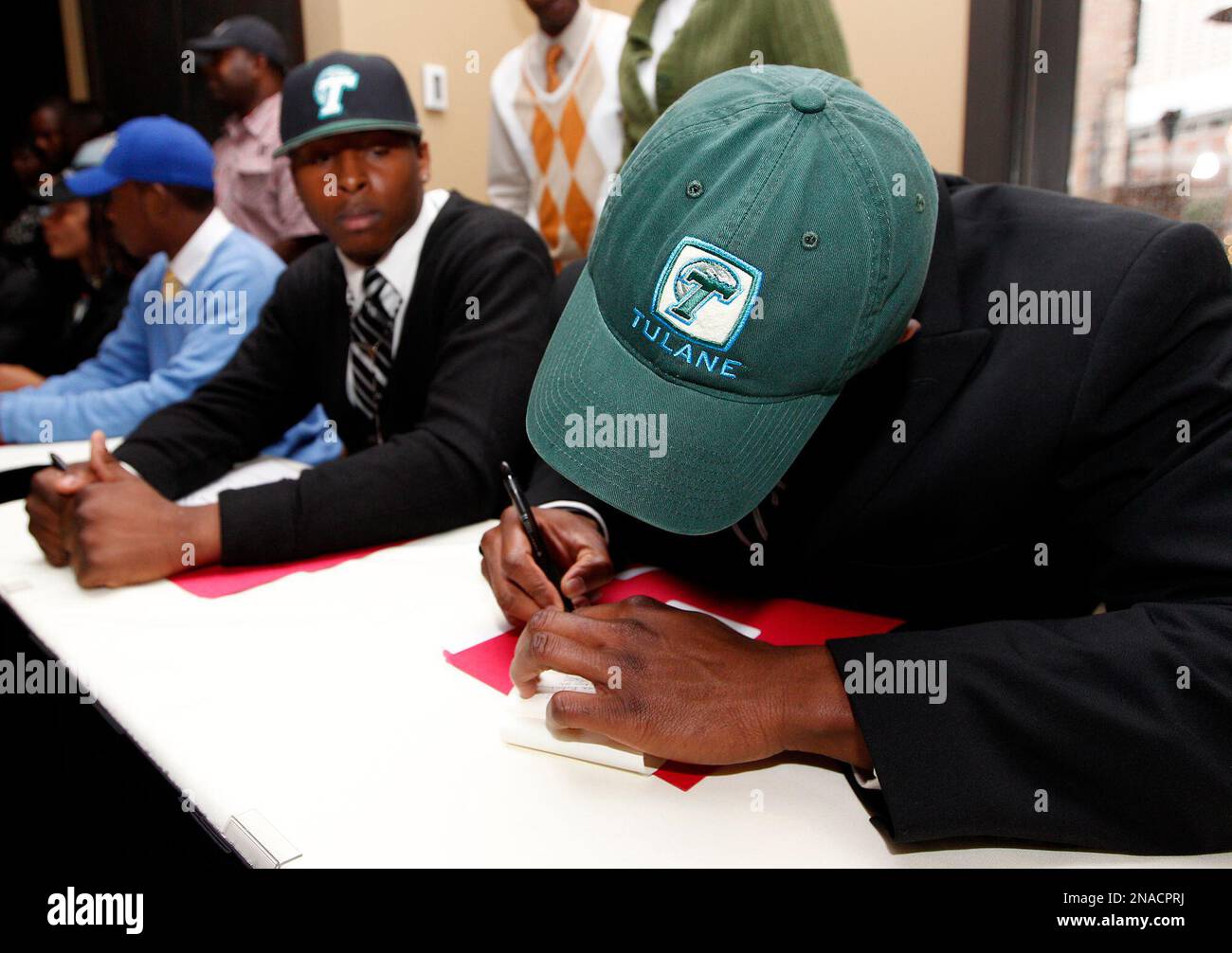 Joshua Rounds, of McMain High School signs a nationa letter of intent ...