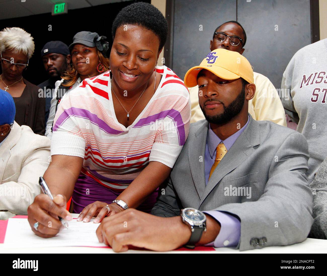 Dwayne Thomas, of O. Perry Walker High School, and his mother Barbara ...