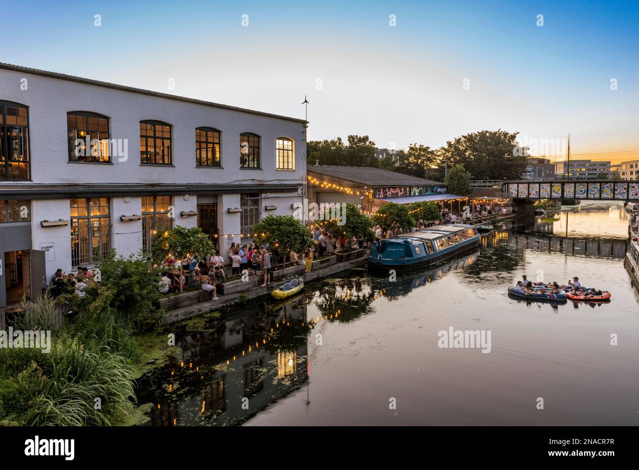 People having fun at sunset in Hackney Wick, London, England; London ...