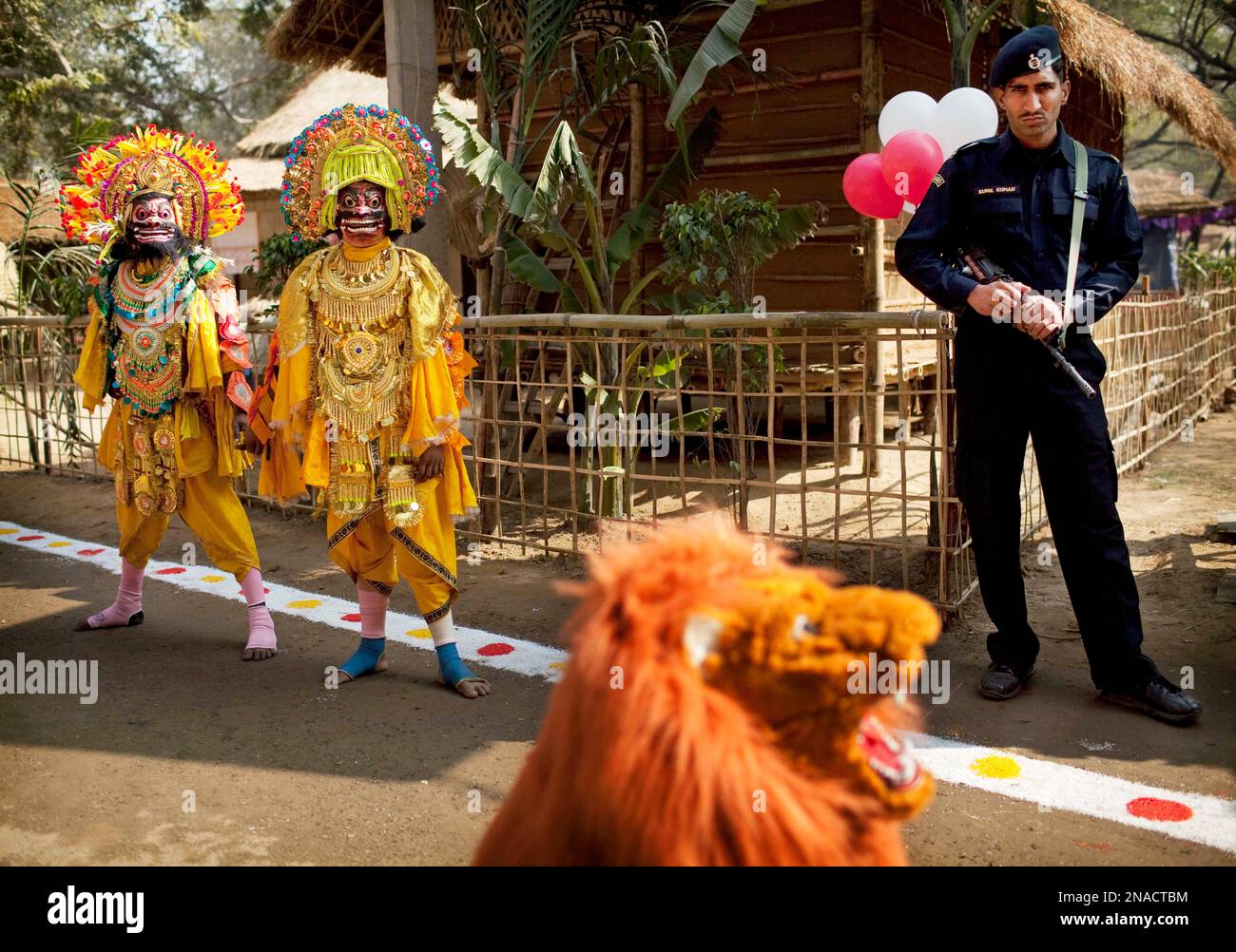 Indian dancers from Karnataka wait to perform as a member of India's ...