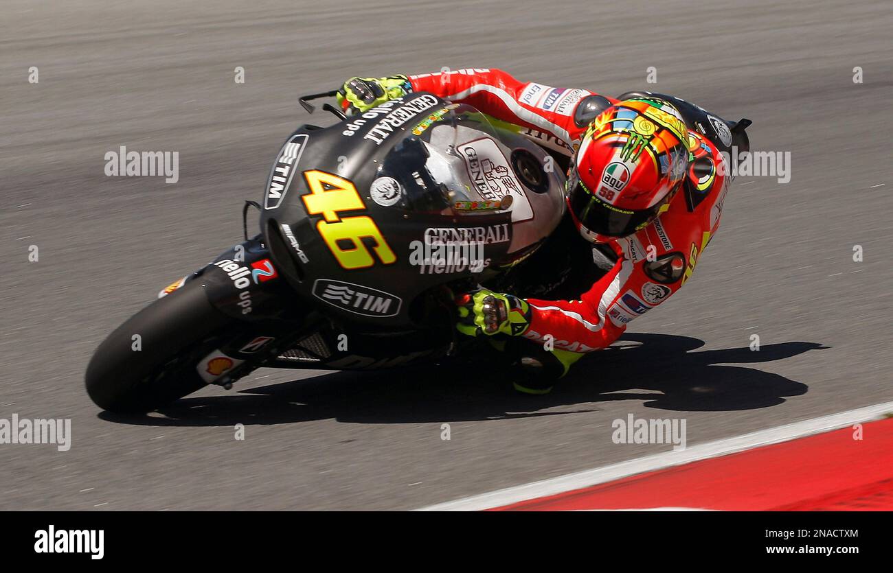 MotoGP rider Valentino Rossi of Italy steers his Ducati during a pre ...