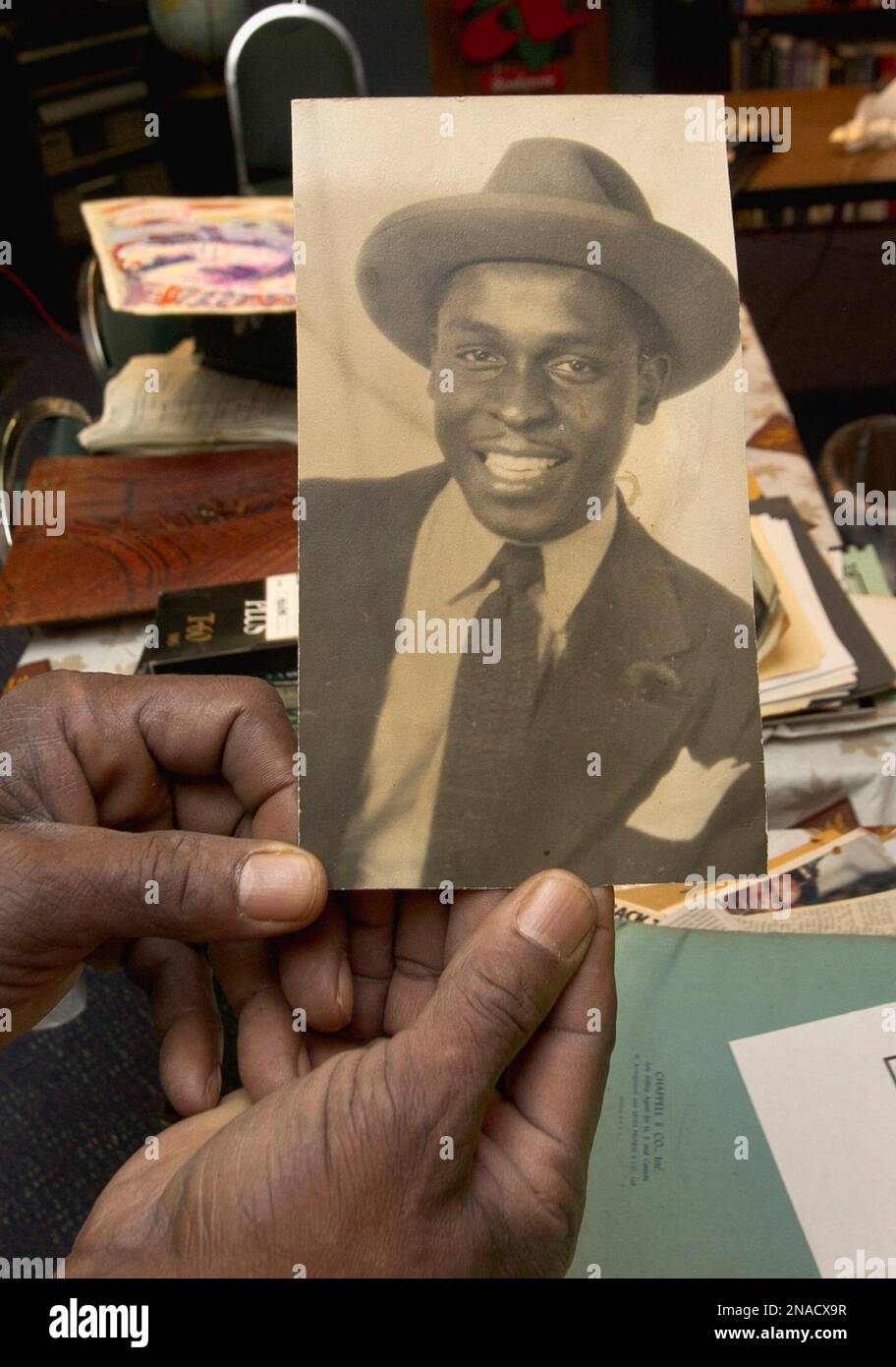 A Photo Of Malcolm Jarvis A Close Friend Of Malcolm X Is Held By Marshall Taylor In Omaha Neb