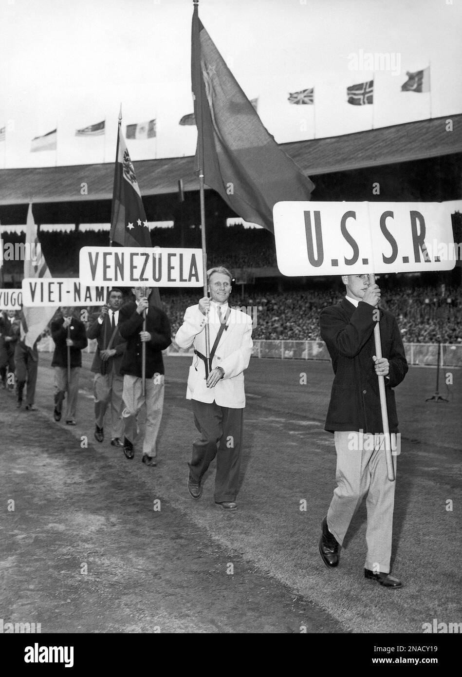 The Soviet flag is carried into the arena during closing ceremonies of ...