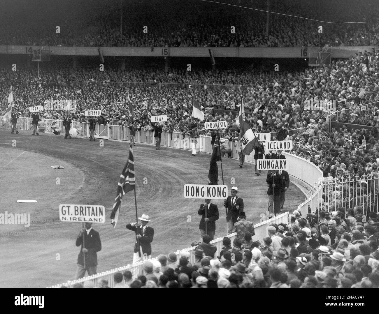 The flags of the competing nations are paraded in the main arena at ...
