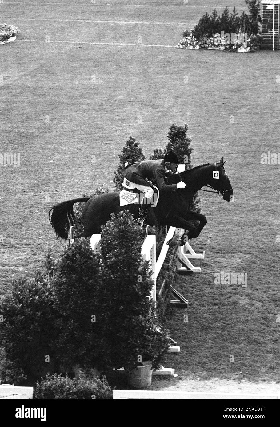 Britain's Richard Hannay Meade takes his mount “Laurieston” over a jump ...