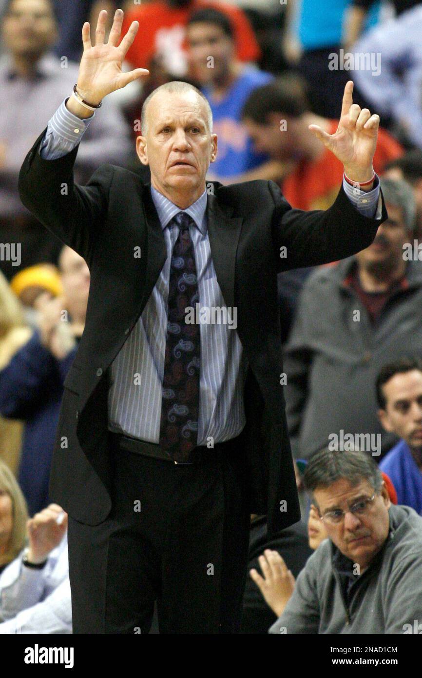 Philadelphia 76ers head coach Doug Collins instructs his team against ...