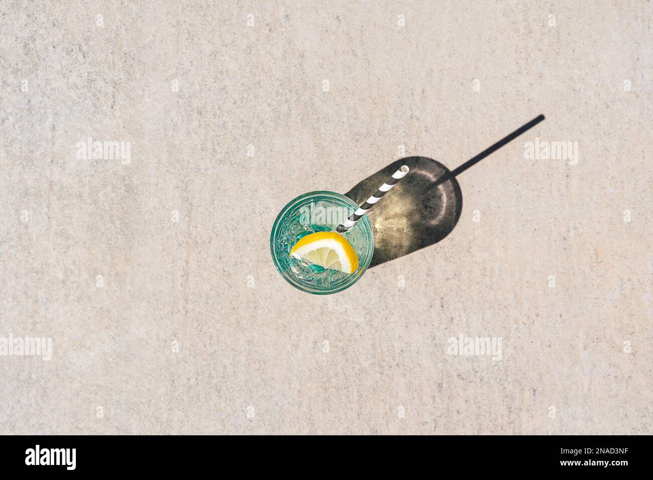 Closeup shot of tropical sparkling mint lemonade cocktail. Blank copy ...