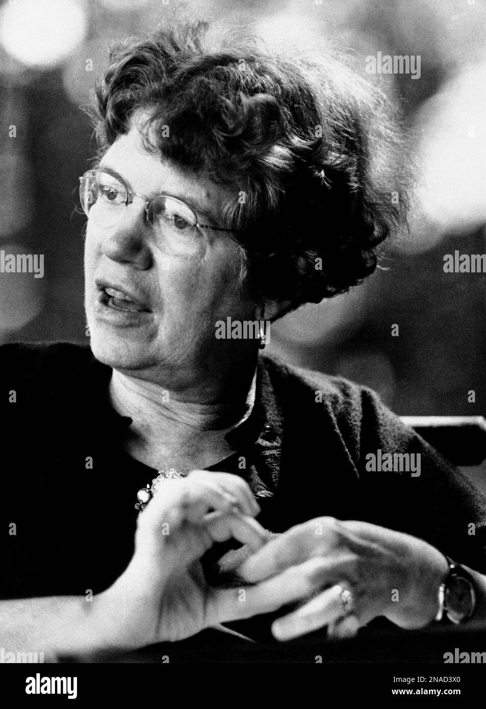 Her eyes are turned aside in this interesting photographic portrait ...