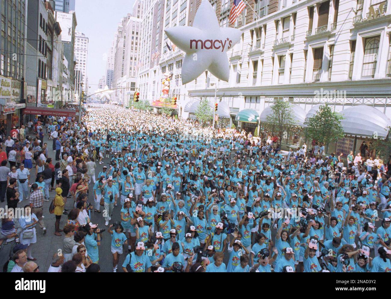 New York’s West 34th Street is packed with more than 6,000 tap dancers during the 14th annual ...